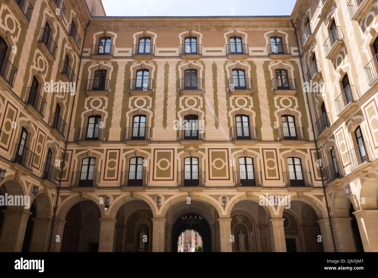 Horizontal shot of the facade of a christian monastery in Montserrat ...