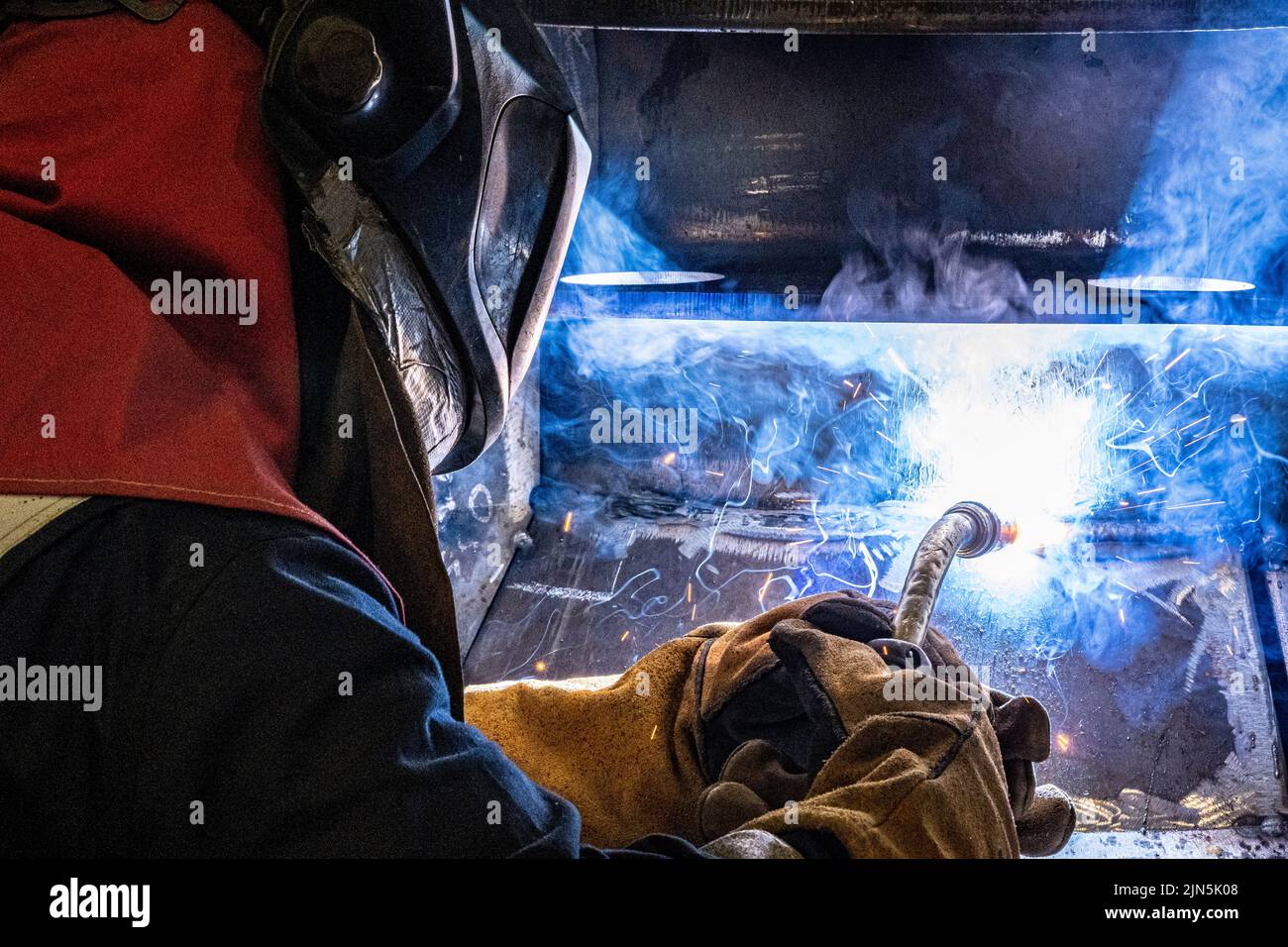 Welders in action Stock Photo - Alamy