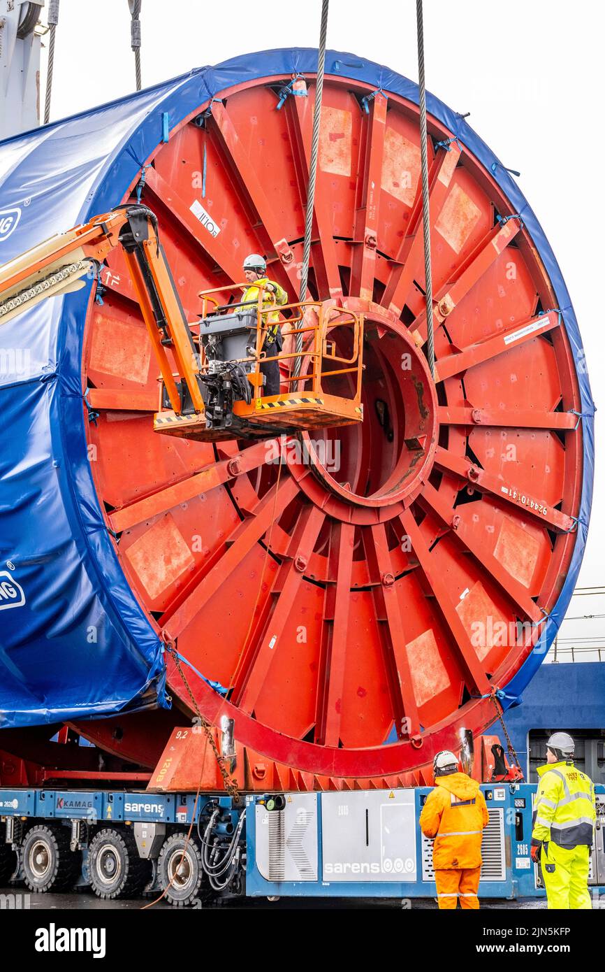Giant Reels being loaded onto a tanker in port Stock Photo - Alamy