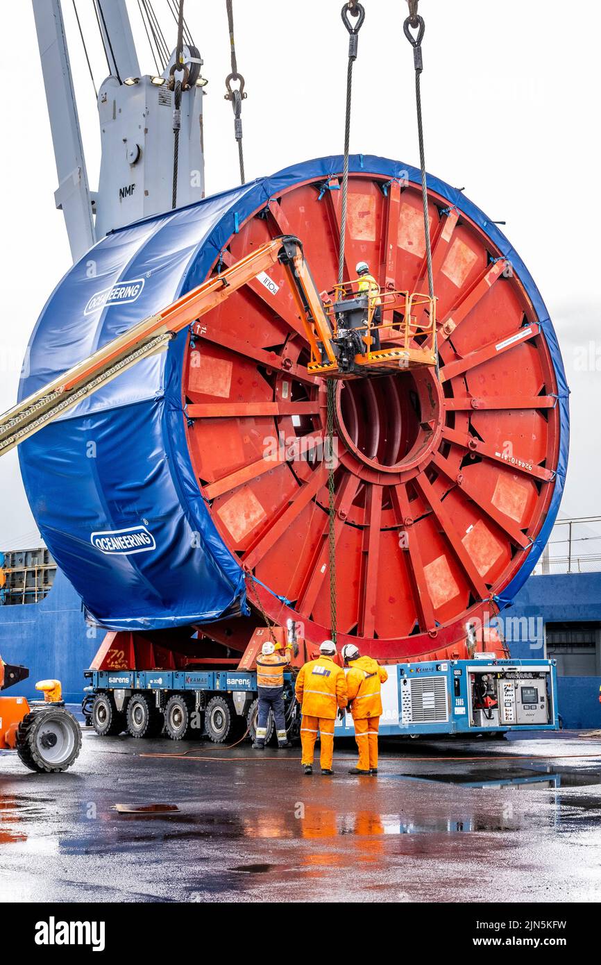 Giant Reels being loaded onto a tanker in port Stock Photo - Alamy