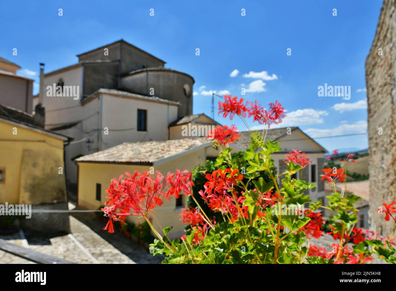 A small street between the old houses of Zungoli, one of the most ...