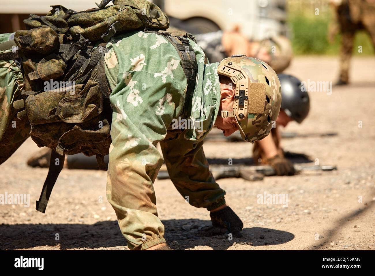 Soldiers game on military training ground battle camp. Action ...