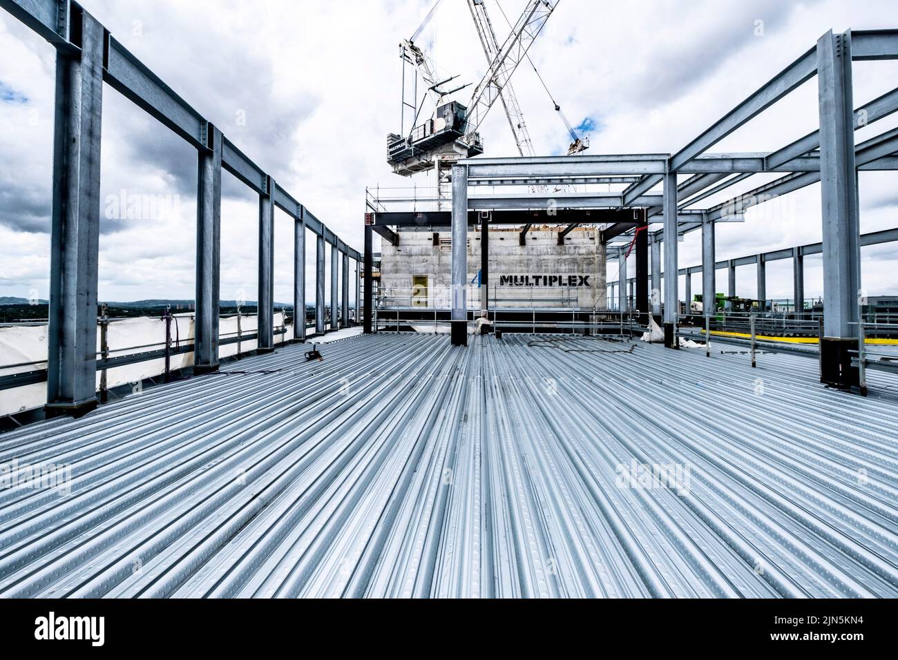 Building construction showing steel beams and working at height Stock ...