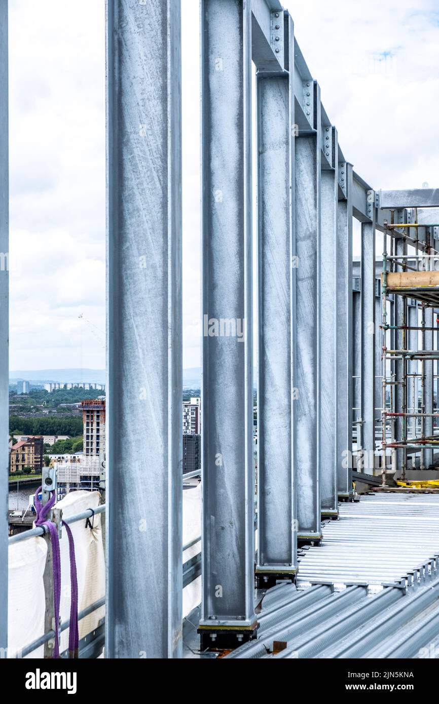 Building construction showing steel beams and working at height Stock ...