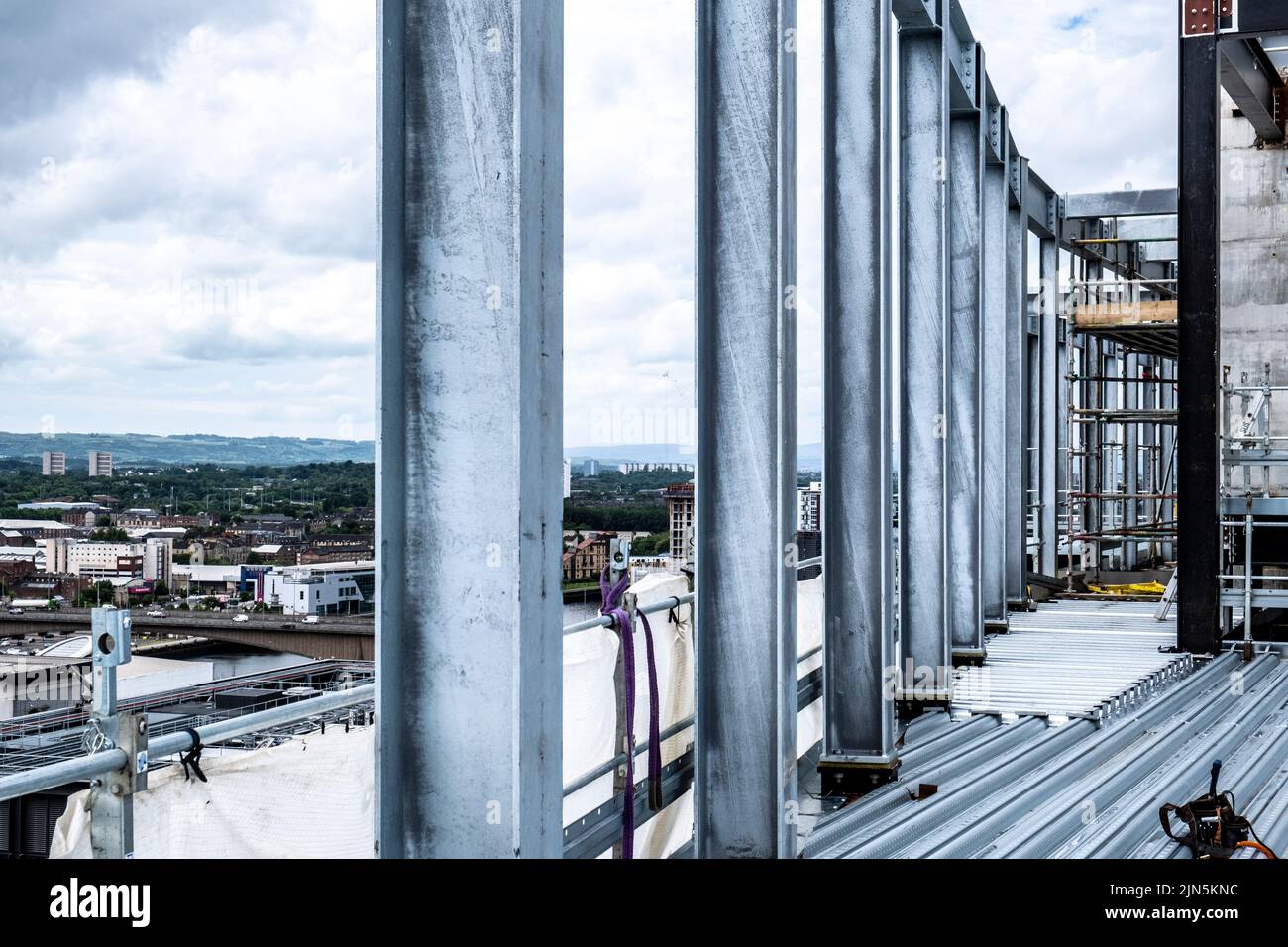 Building construction showing steel beams and working at height Stock ...