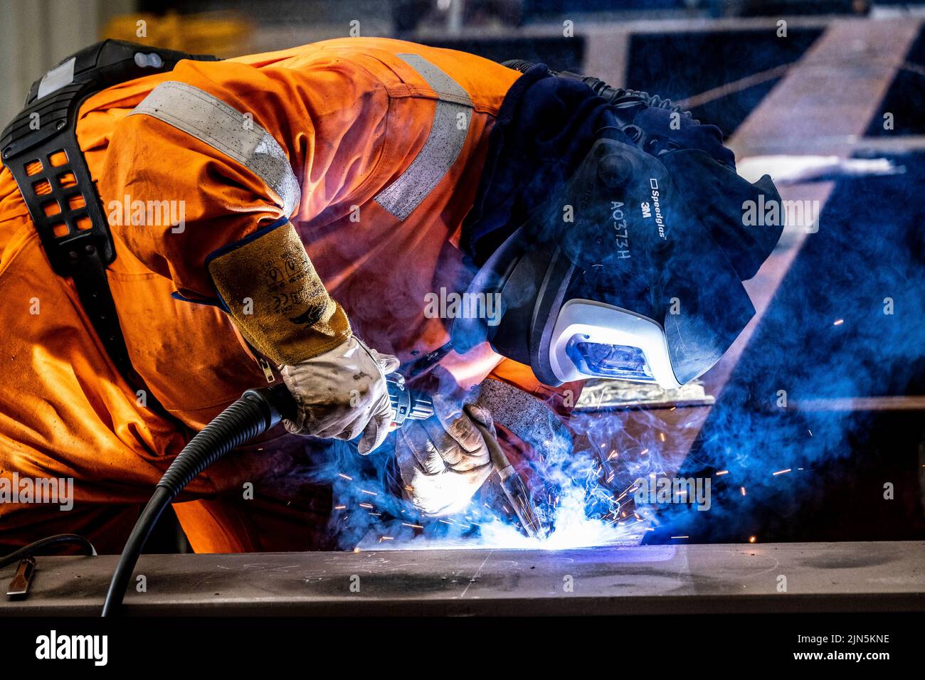 Welders in action Stock Photo - Alamy