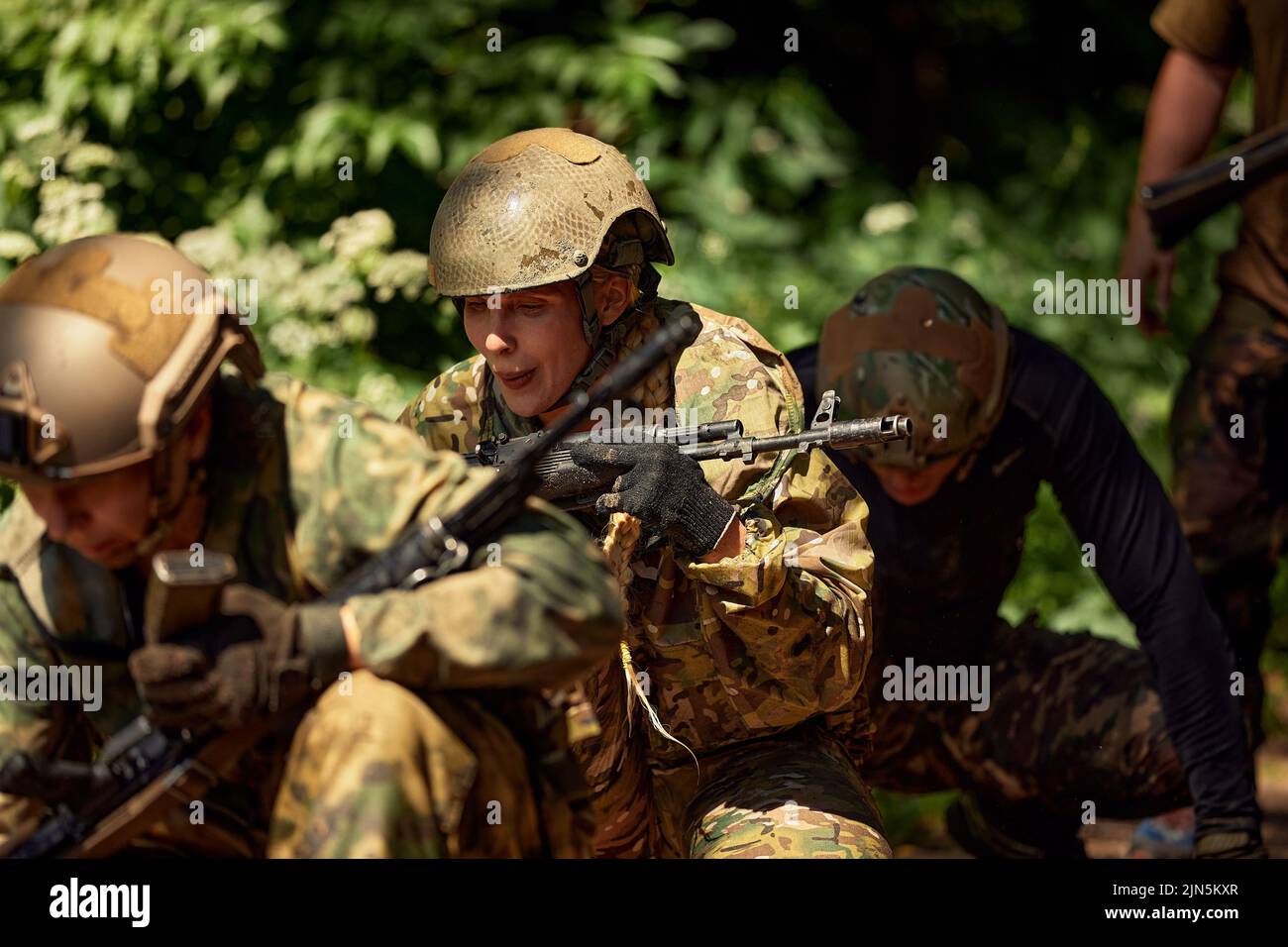 Soldiers game on military training ground battle camp. Action ...
