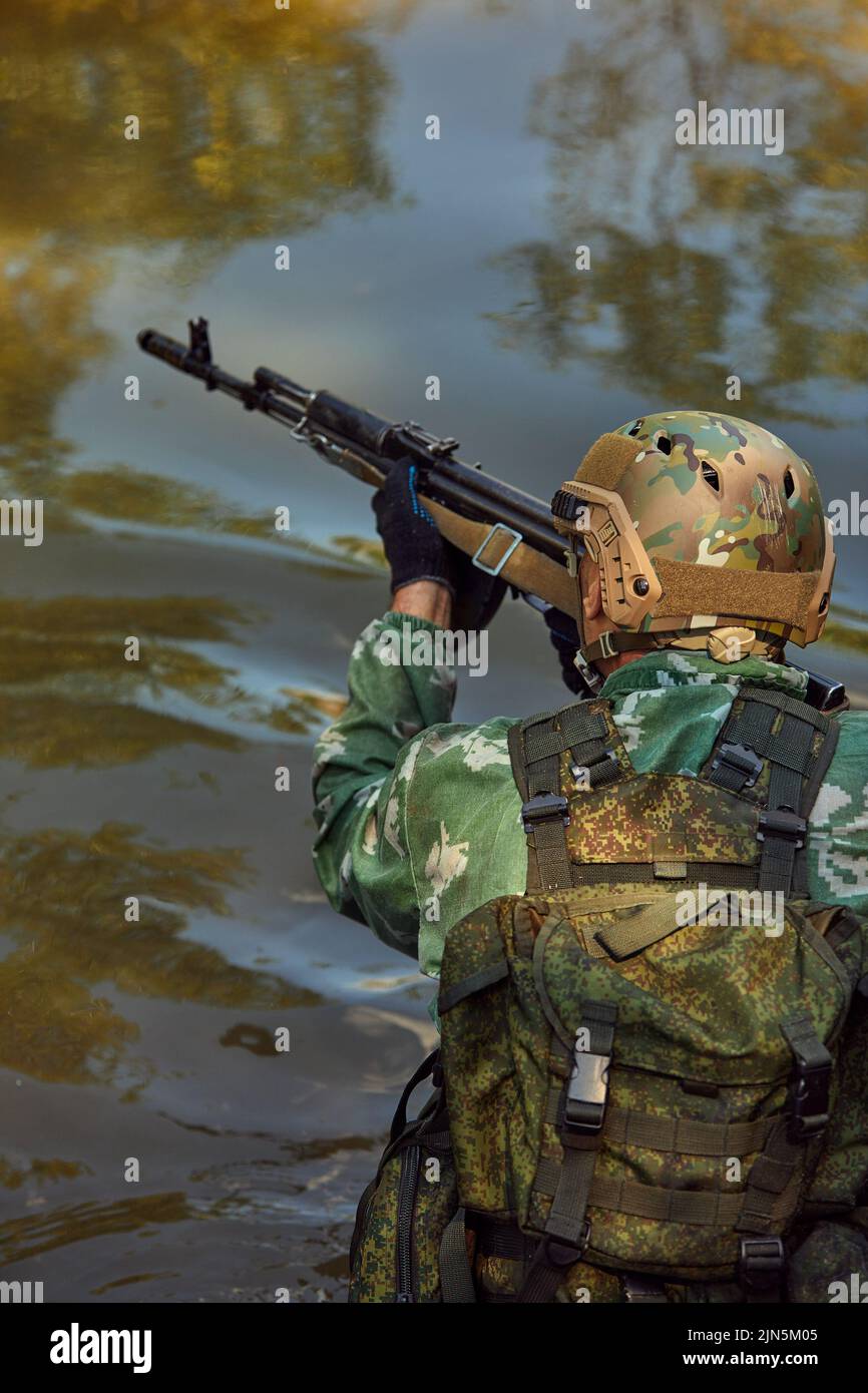 Soldiers game on military training ground battle camp. Action ...