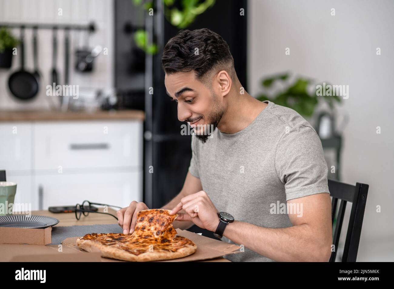 Positive man touching table hi-res stock photography and images - Alamy