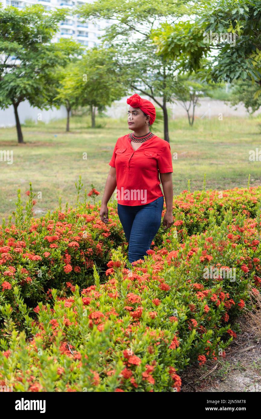 Latin woman enjoying a walk in nature Stock Photo - Alamy