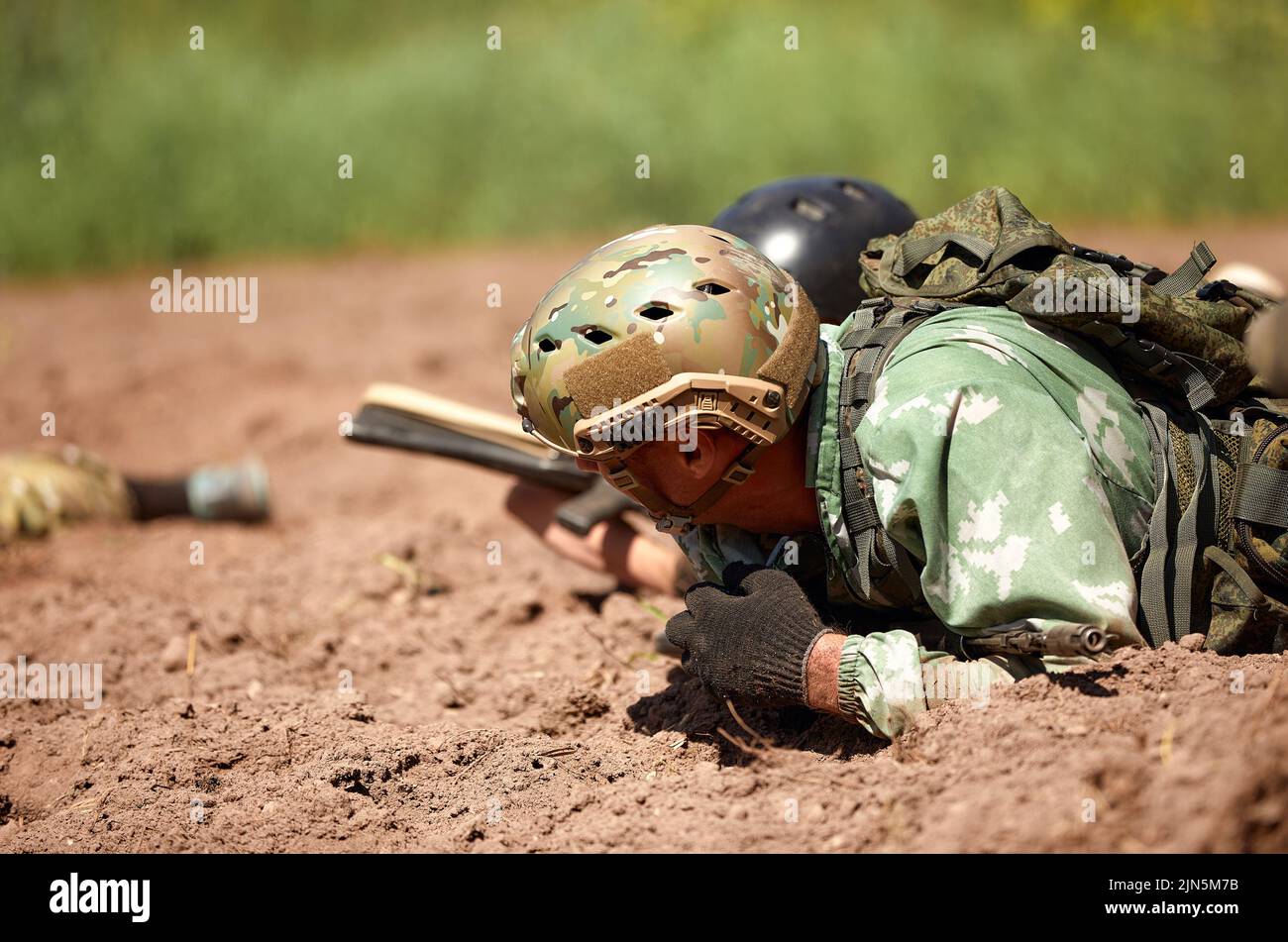 Special forces soldier with weapon take part in military maneuver. War ...