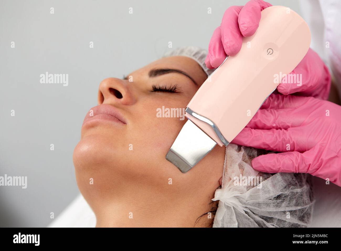 Skin Care. Close-up Of Beautiful Woman Receiving Ultrasound Cavitation ...