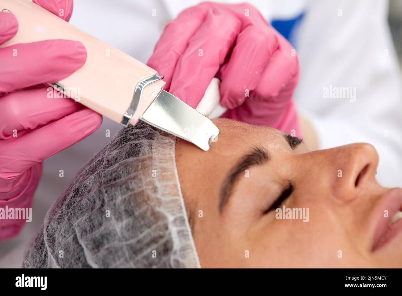 Skin Care. Close-up Of Beautiful Woman Receiving Ultrasound Cavitation ...