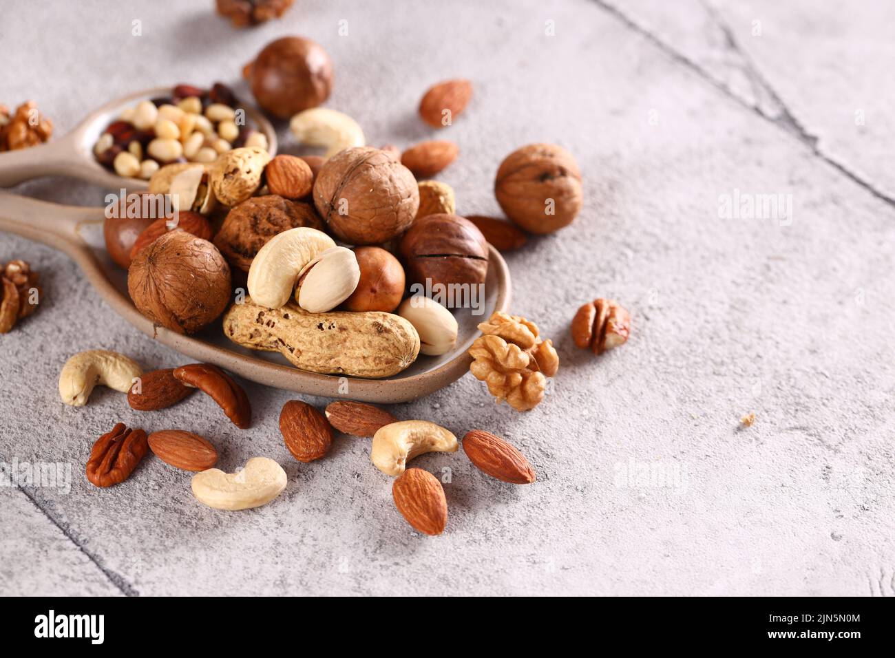 natural mix nuts, peeled and whole Stock Photo - Alamy