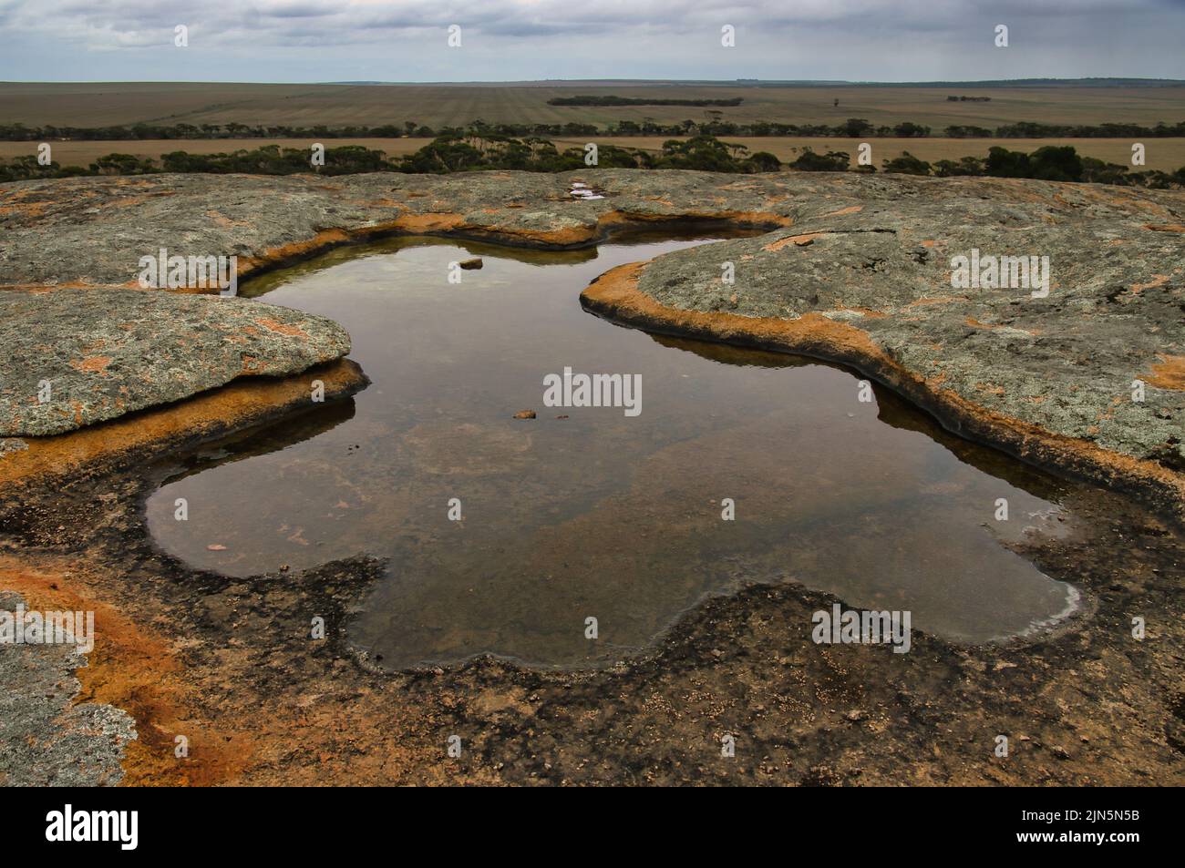 Pools in the granite, lichen-covered Polda Rock Reserve, that ...