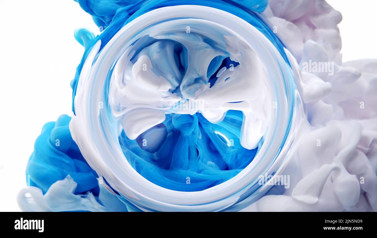 A splash of blue and white ink isolated on a white background Stock ...