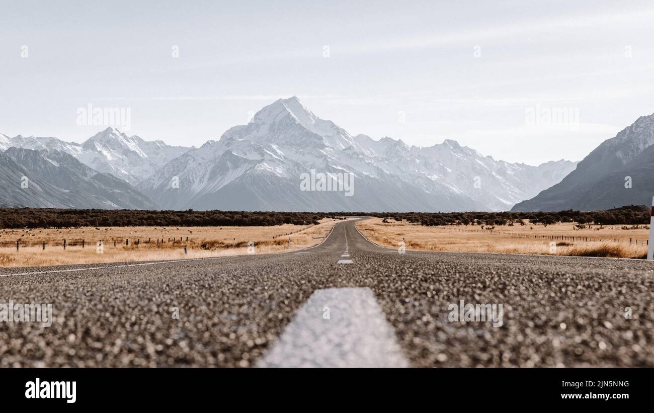 View of the majestic Aoraki Mount Cook with the road leading to Mount ...