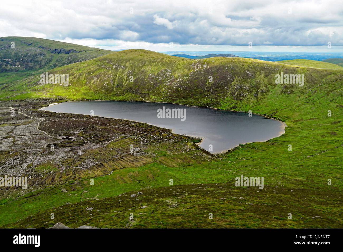 Aerial view of Lough Shannagh in Mourne Mountains, Northern Ireland ...