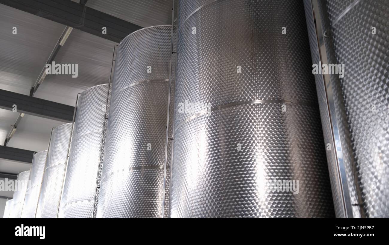 Line of industrial chemical tanks in chemical pharmaceutical production ...