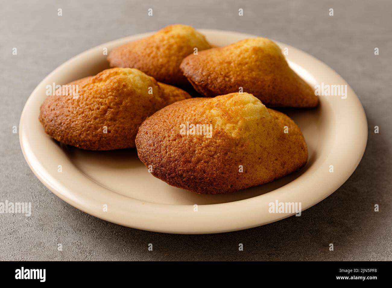 Madeleine, a sweet and soft French pastry Stock Photo - Alamy