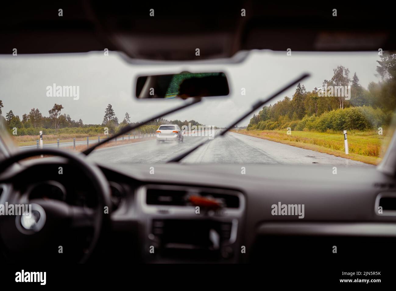 Driving car in bad weather conditions. Heavy rain Stock Photo - Alamy