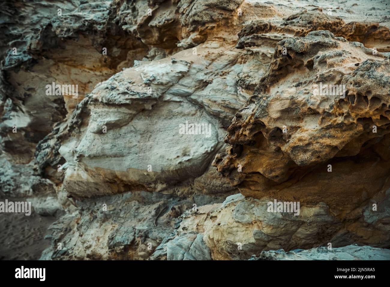 The giant rock formation texture on the Guincho beach in Cascais ...