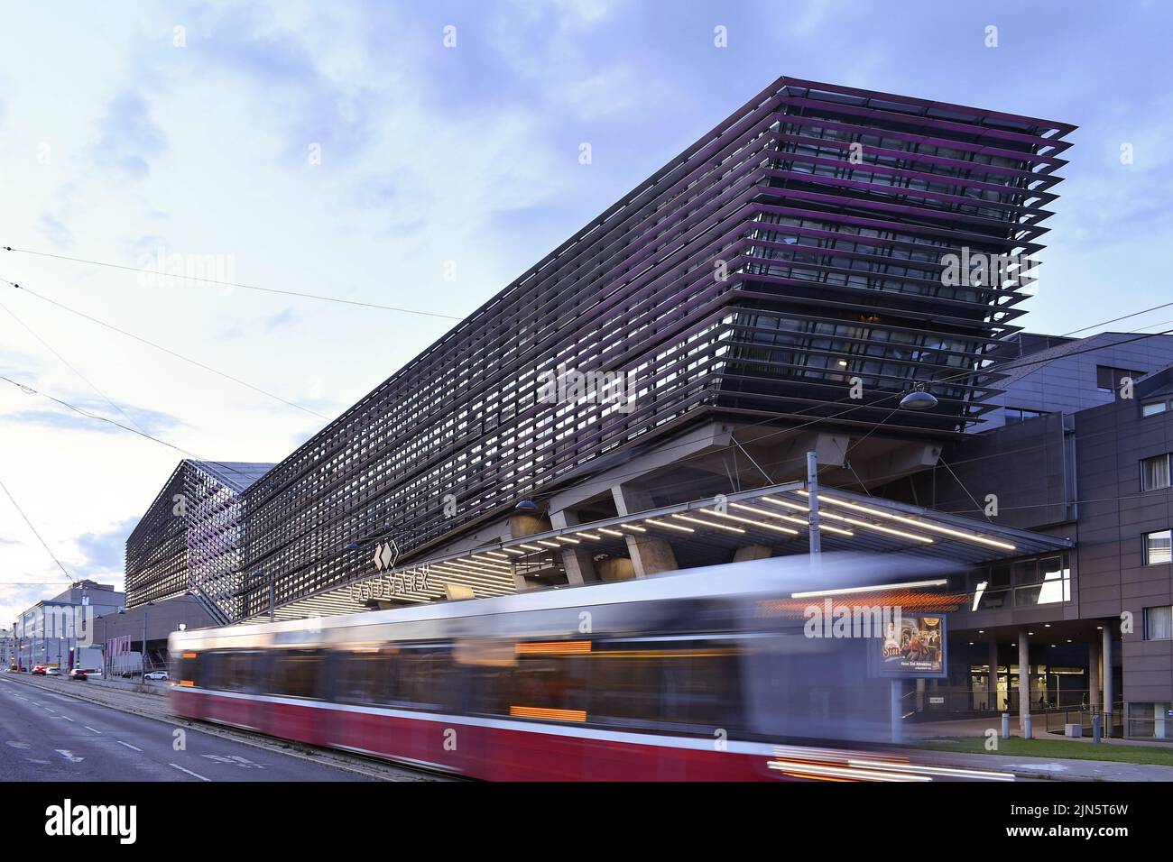 Tram passing by T-Center building, modern office development located in ...