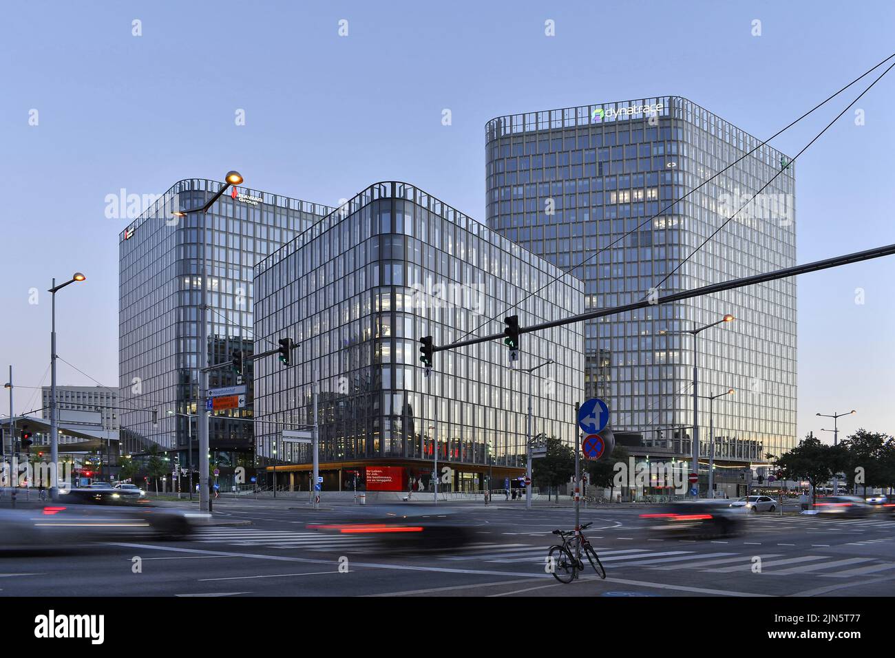 The Icon Vienna - modern glass office buildings and driveway at dusk ...