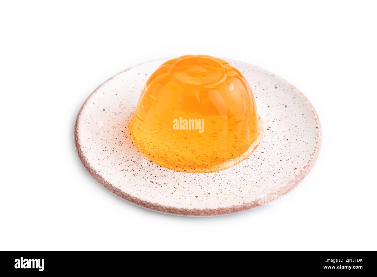 Apricot orange jelly isolated on white background. side view, close up ...