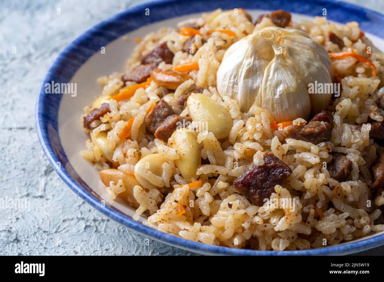 Traditional delicacies, Uzbek pilaf (Turkish name; Ozbek pilavi Stock ...