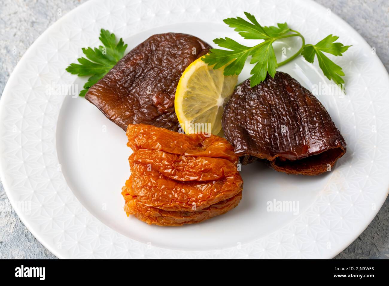 Dried eggplant stuffed and dried pepper stuffed with rice, tomato and ...