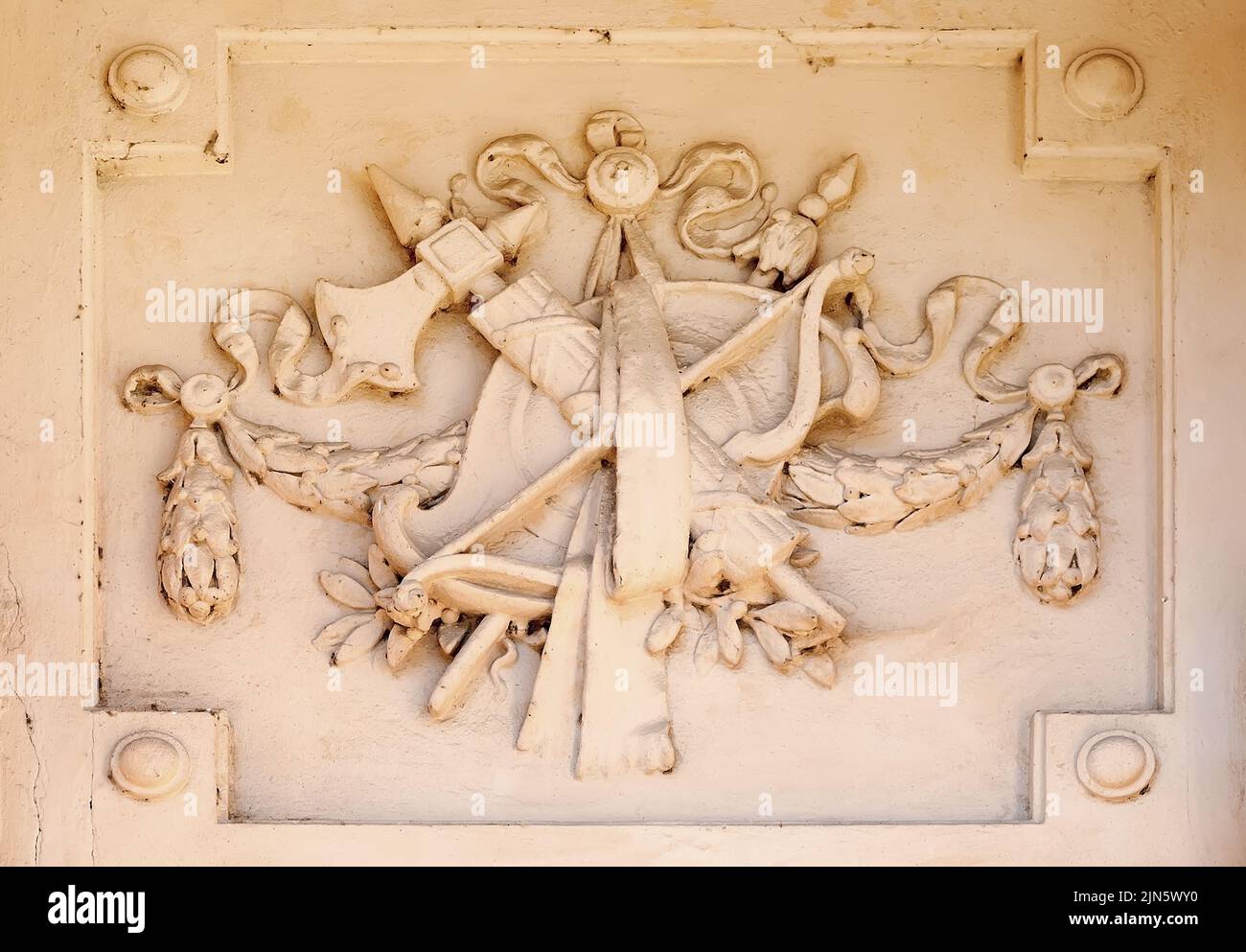 Ancient coat of arms on the facade of the Badeni palace in Koropets ...