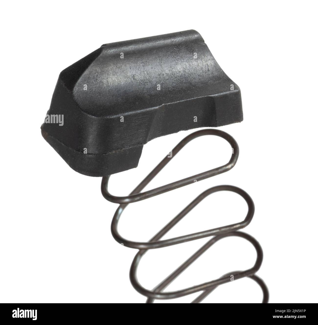Isolated pistol magazine spring and follower on a white background ...