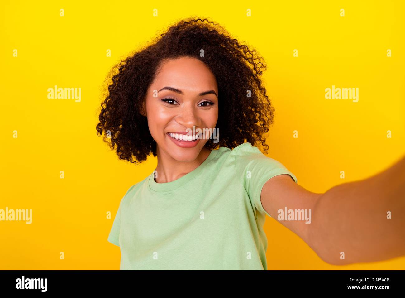 Photo Of Adorable Pretty Girl Dressed Green T Shirt Smiling Tacking