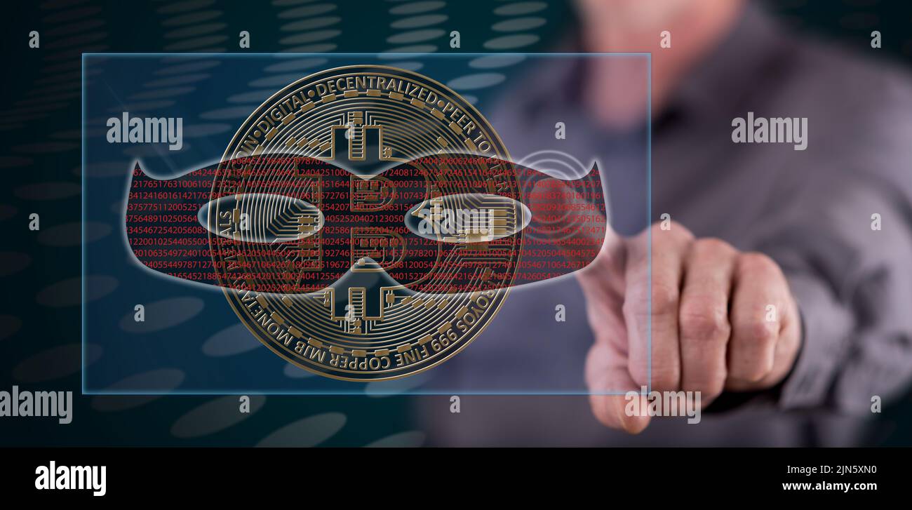 Man touching a bitcoin hacking concept on a touch screen with his ...
