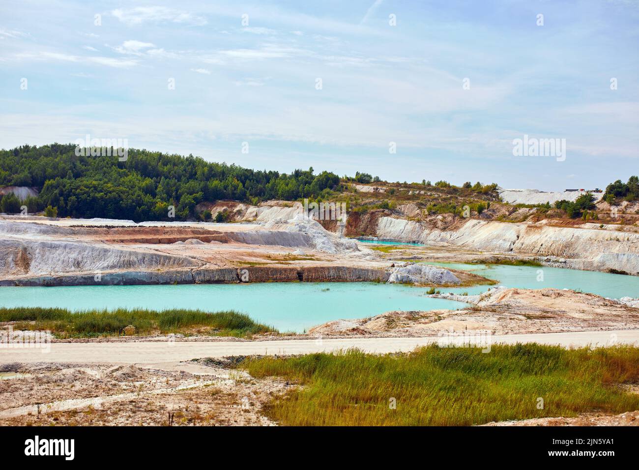 Quarry extraction porcelain clay, kaolin, with turquoise water and ...