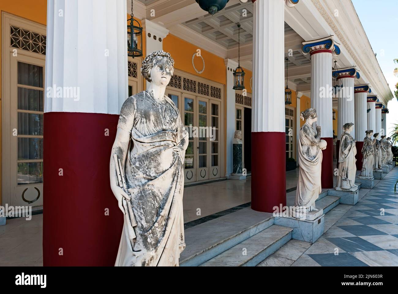 Statues of Greek mythical muses on the balcony of Achilleion palace in ...