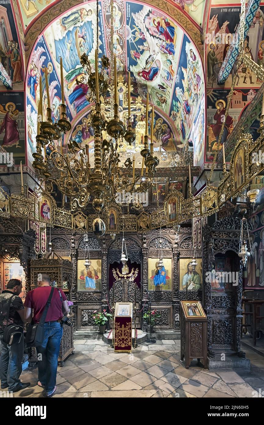 Two tourists in The Holy Trinity Monastery (known as Agia Triada; all ...