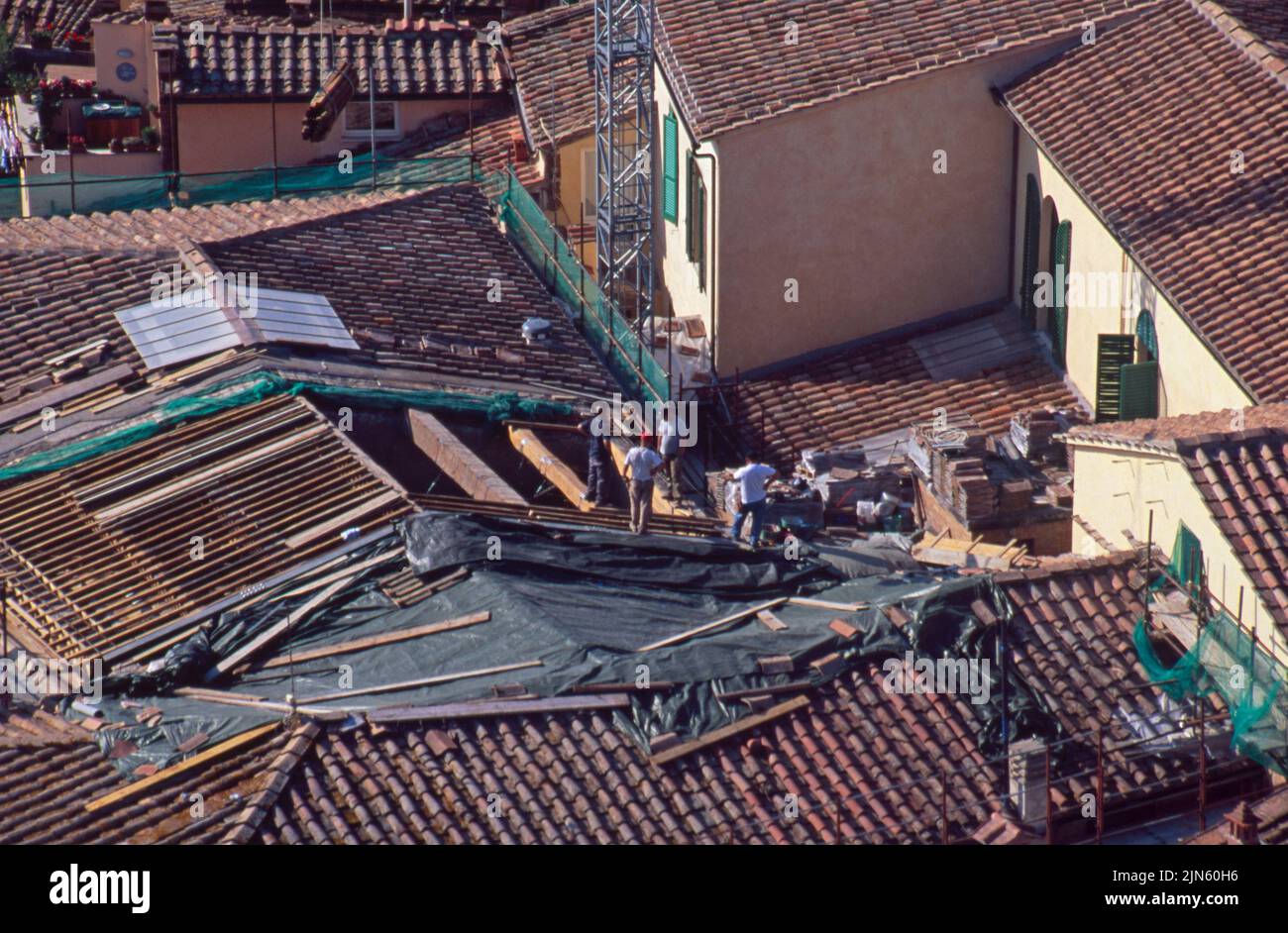 New roof being built on a house Florence Tuscany Italy Stock Photo - Alamy