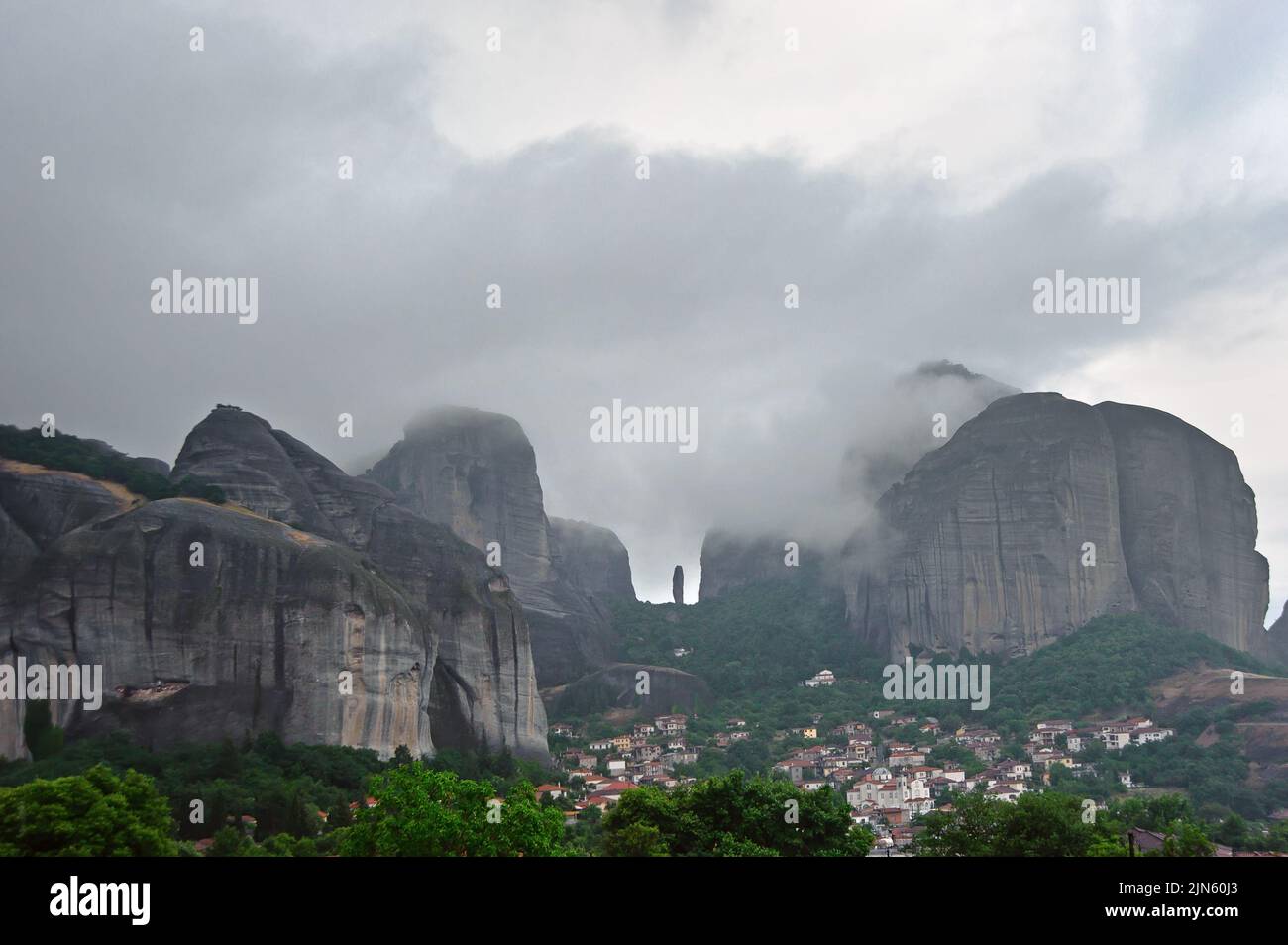 Meteora mountains in the fog after the rain, Greece Stock Photo - Alamy