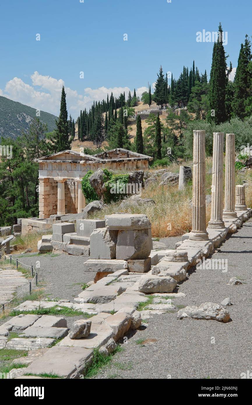 View of the Athenian Treasury; the Stoa of the Athenians on the right ...
