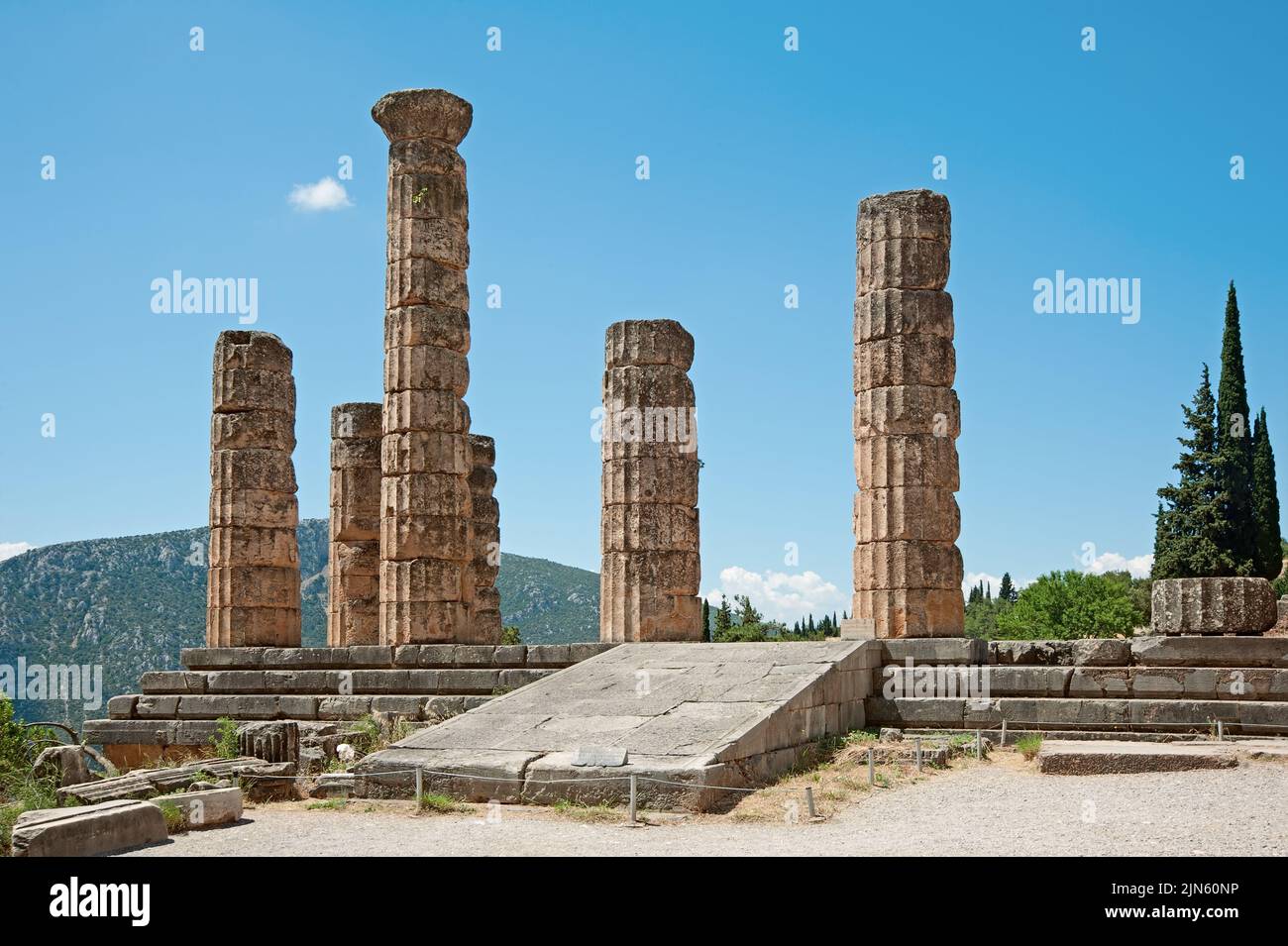 Five standing columns of Temple of Apollo in Delphi, Greece Stock Photo ...