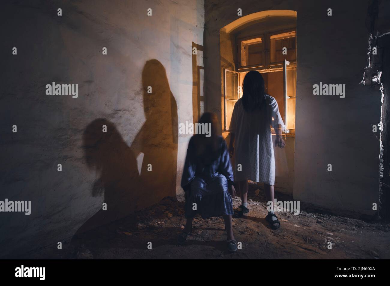 Ghosts in abandoned, haunted house. Horror scene of scary spirit of a ...