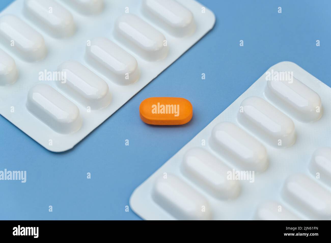 Vitamins tablets supplements Medicine and two containers with Blue and ...