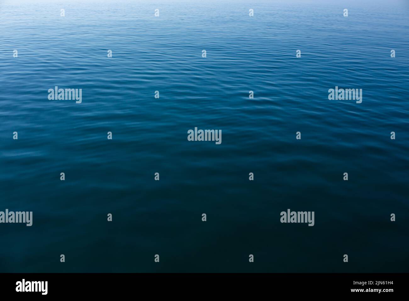 Beautiful calm summer sea Landscape with deep blue water Stock Photo ...