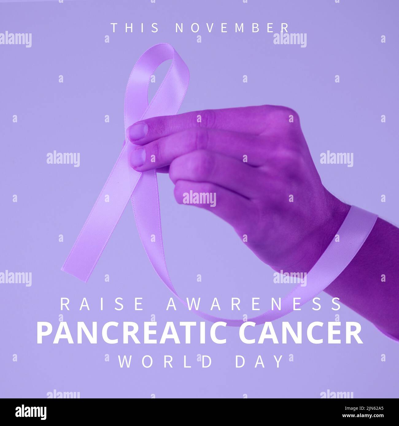 Composition of pancreatic cancer day text with hand holding purple ...
