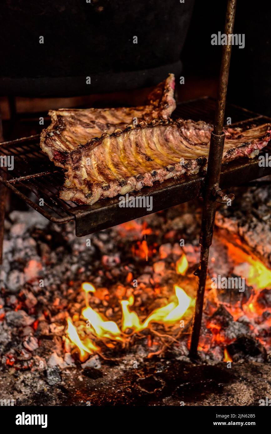 Roasted Crispy Ribs, traditional Argentinian barbecue Stock Photo - Alamy