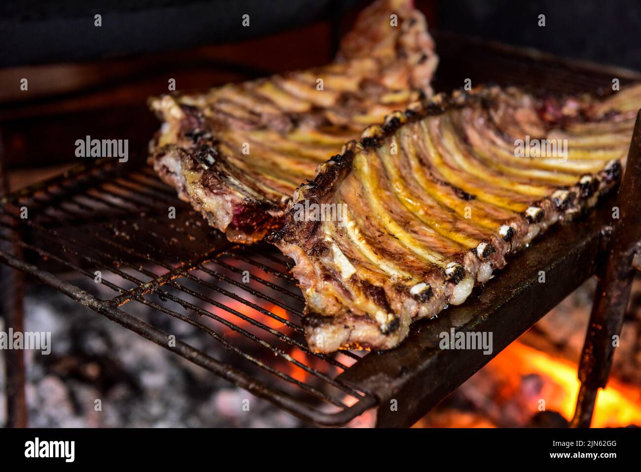 Roasted Crispy Ribs, traditional Argentinian barbecue Stock Photo - Alamy