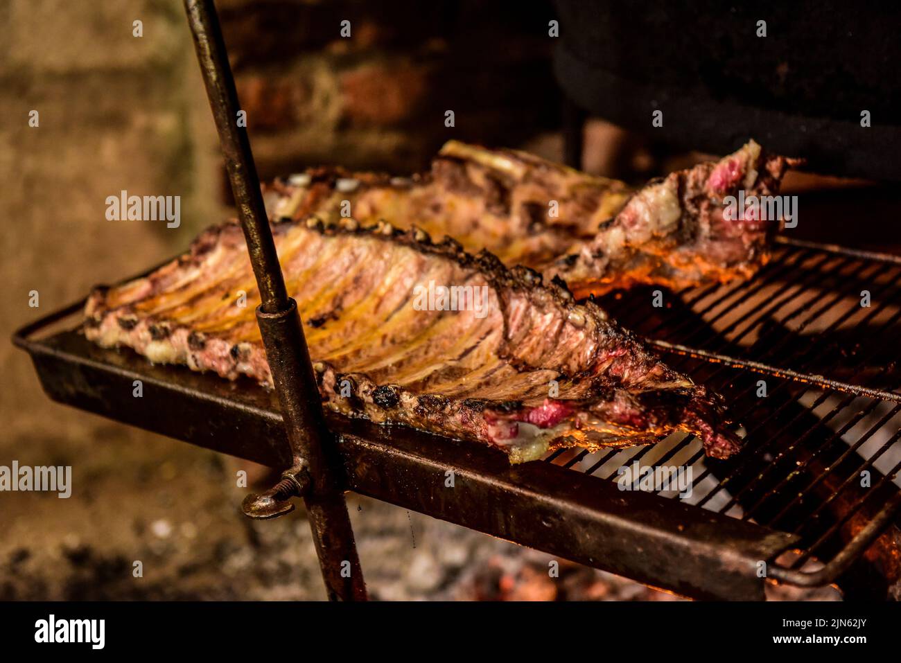 Roasted Crispy Ribs, traditional Argentinian barbecue Stock Photo - Alamy