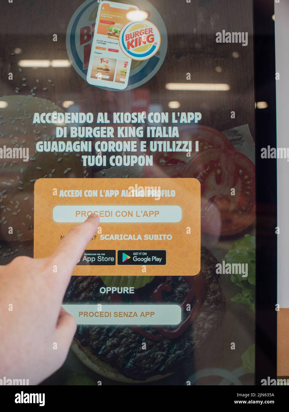 woman orders meal in the electronic touch screen terminal menu in the ...